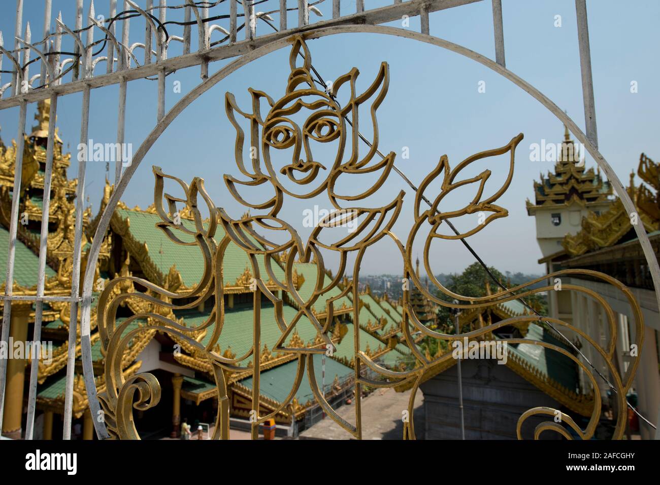 Temple railing in design of deity, Shwedagon Pagoda, Yangon, Myanmar ...