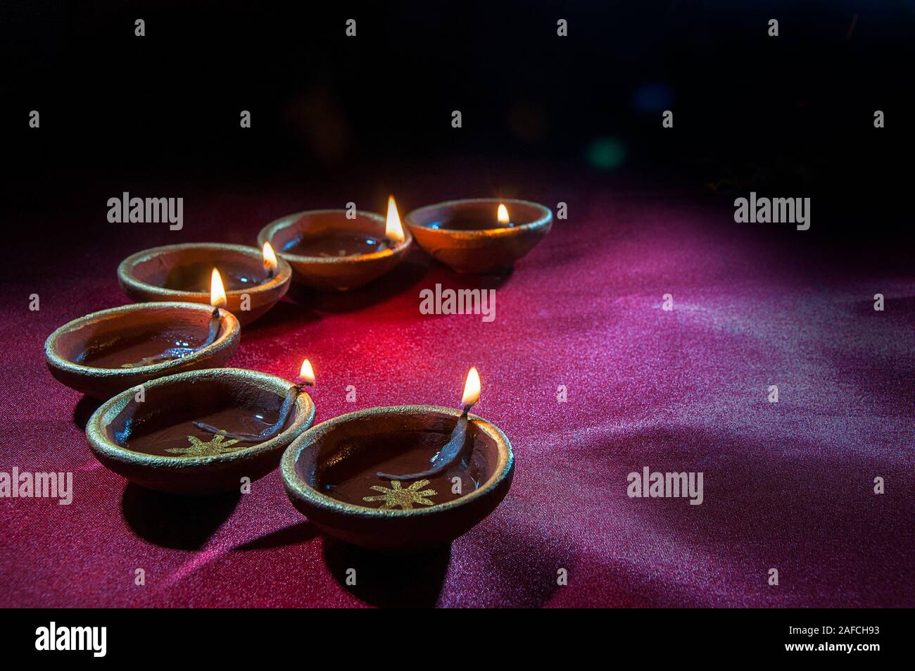 Clay diya lamps lit during Diwali Celebration. Greetings Card Design ...