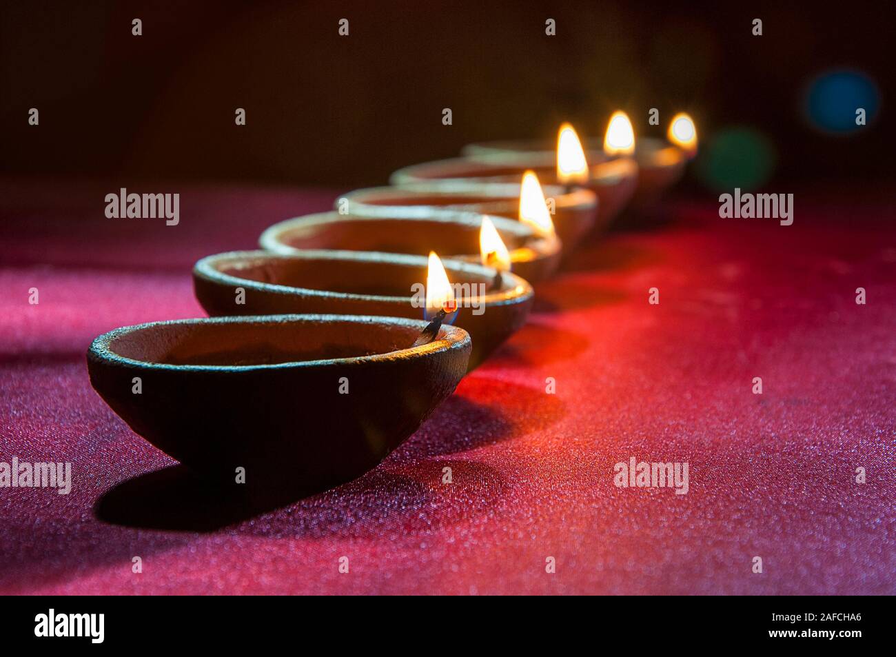 Clay diya lamps lit during Diwali Celebration. Greetings Card Design ...