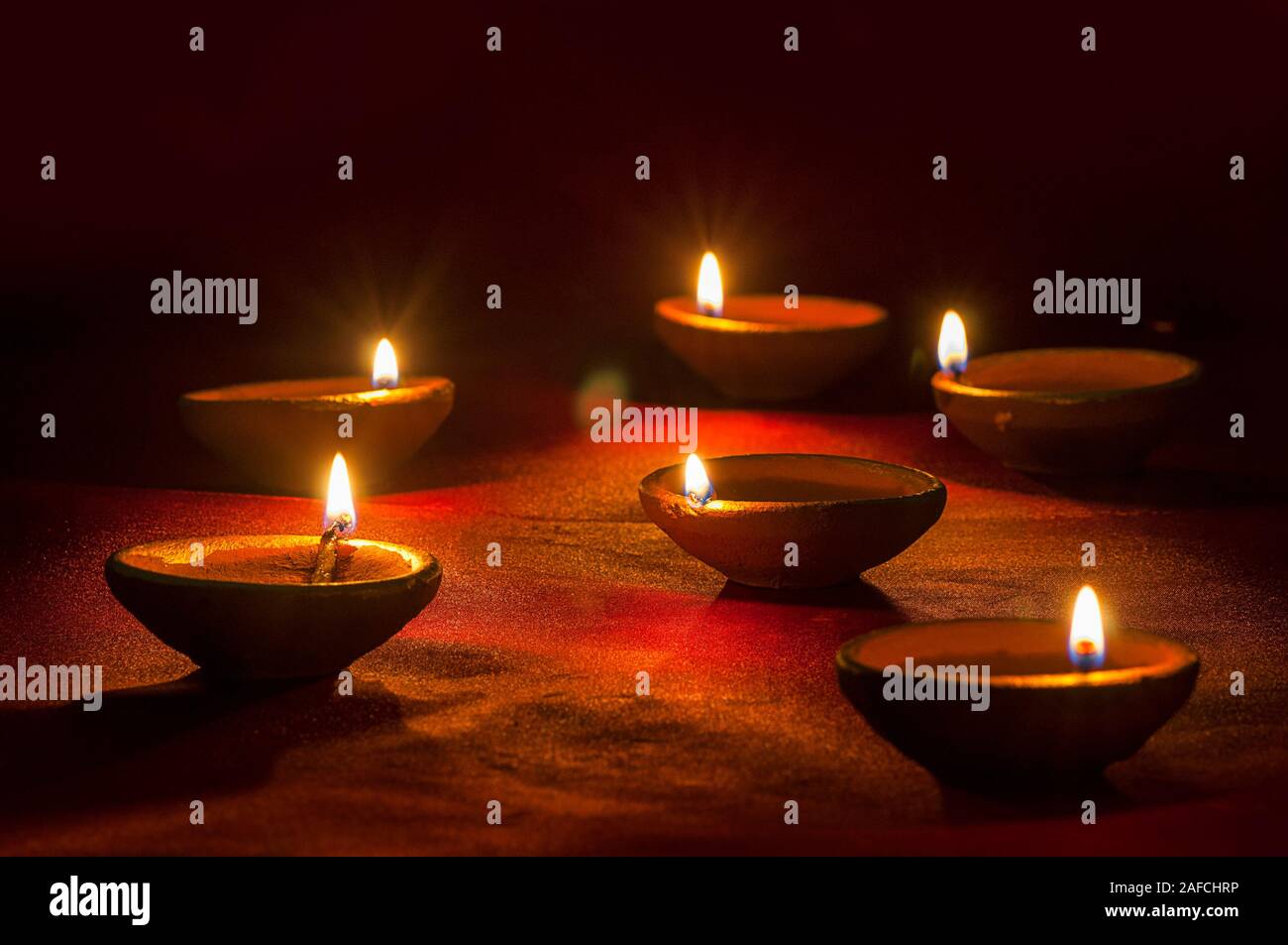 Clay diya lamps lit during Diwali Celebration. Greetings Card Design ...
