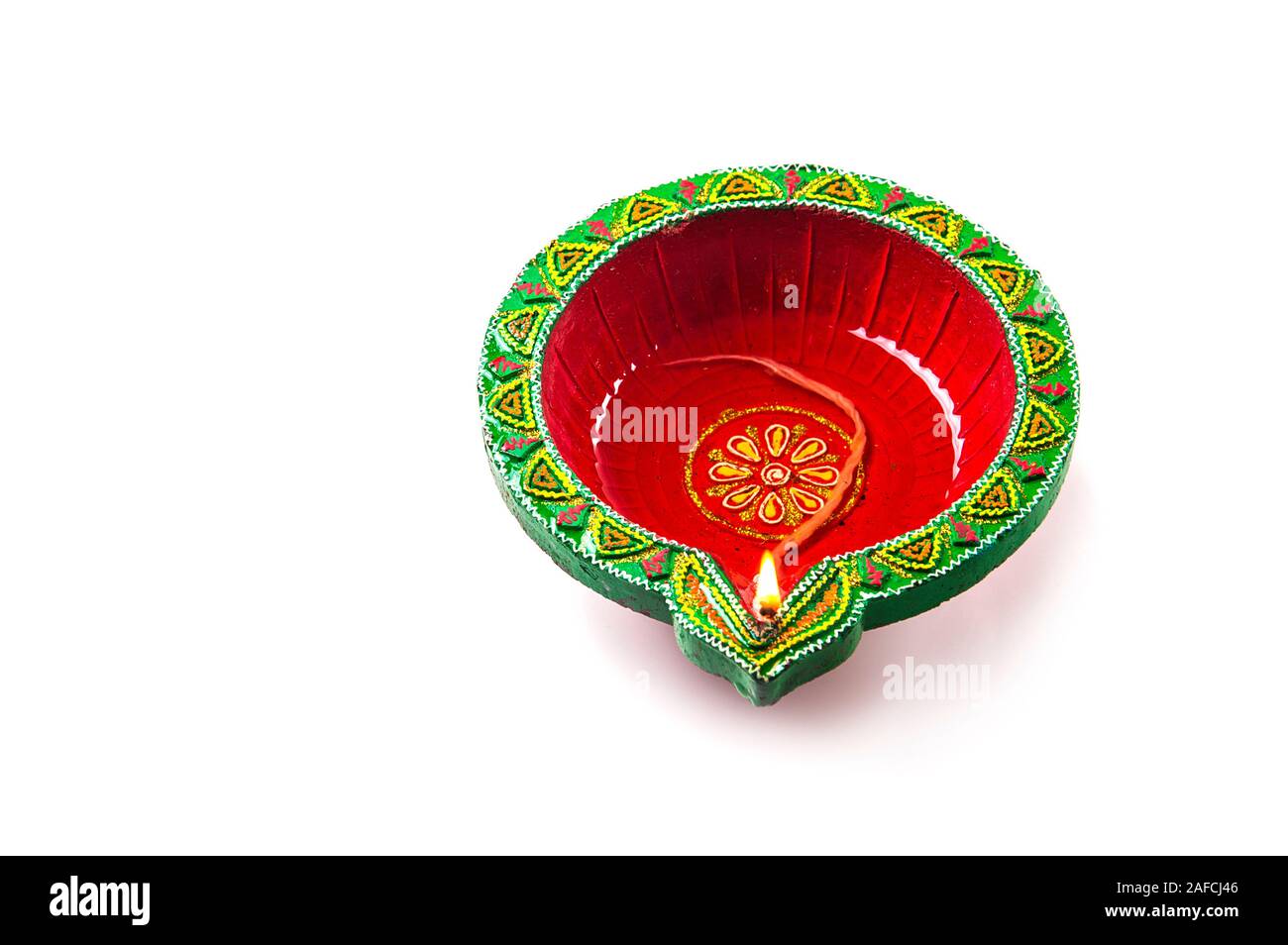 Single Clay diya lamp lit during diwali festival. Happy Diwali ...