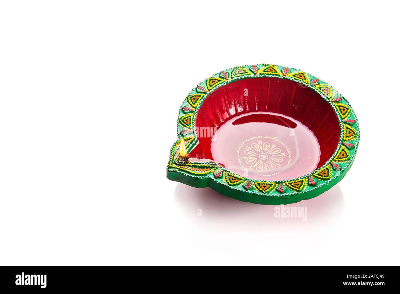 Single Clay diya lamp lit during diwali festival. Happy Diwali ...