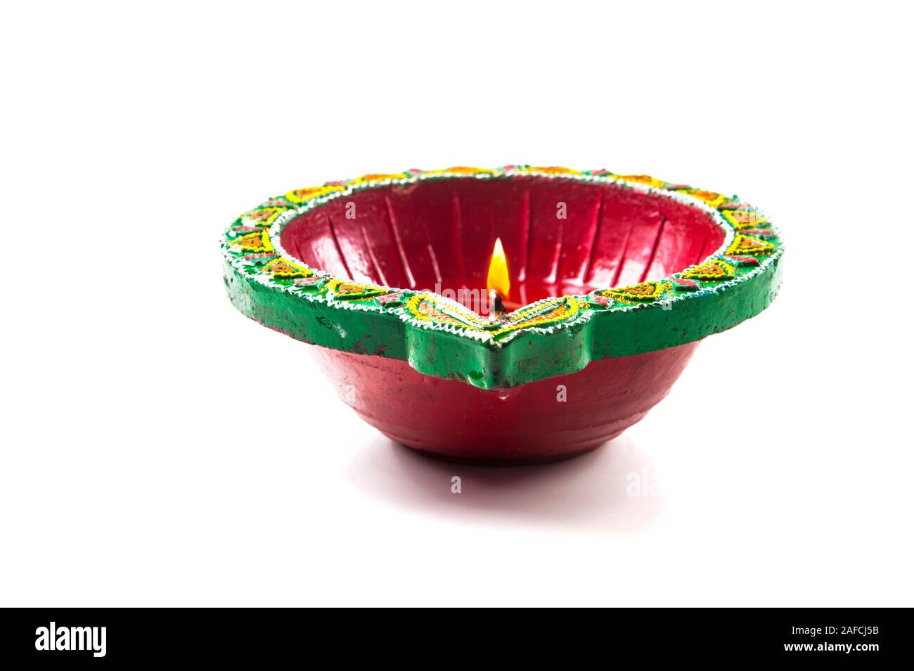 Single Clay diya lamp lit during diwali festival. Happy Diwali ...