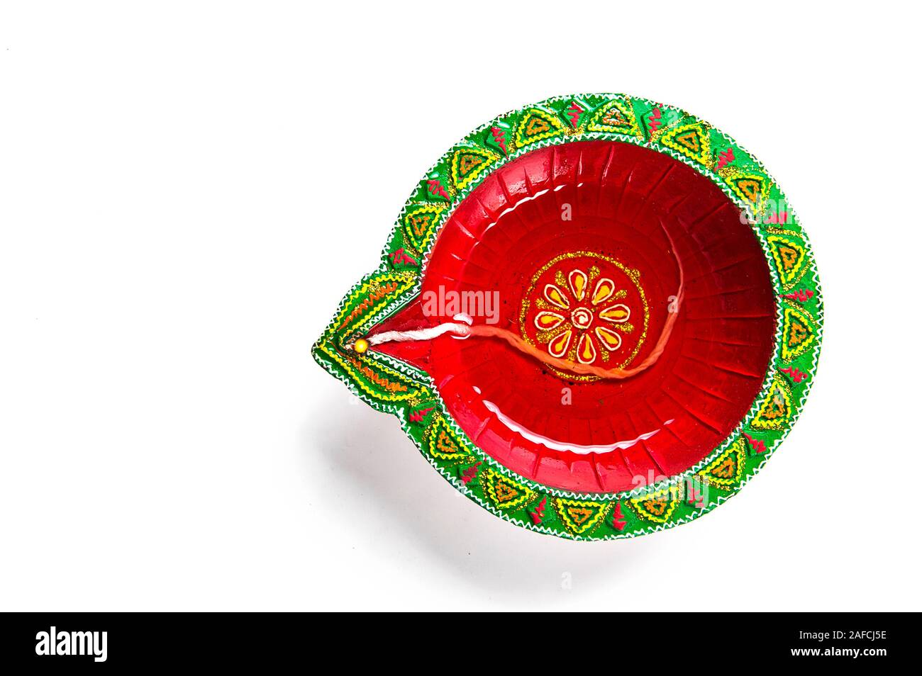 Single Clay diya lamp lit during diwali festival. Happy Diwali ...