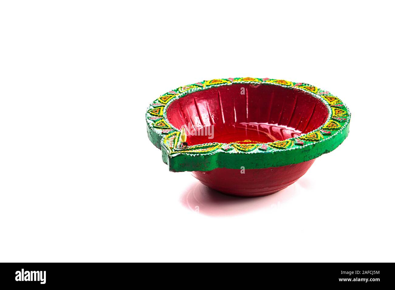 Single Clay diya lamp lit during diwali festival. Happy Diwali ...