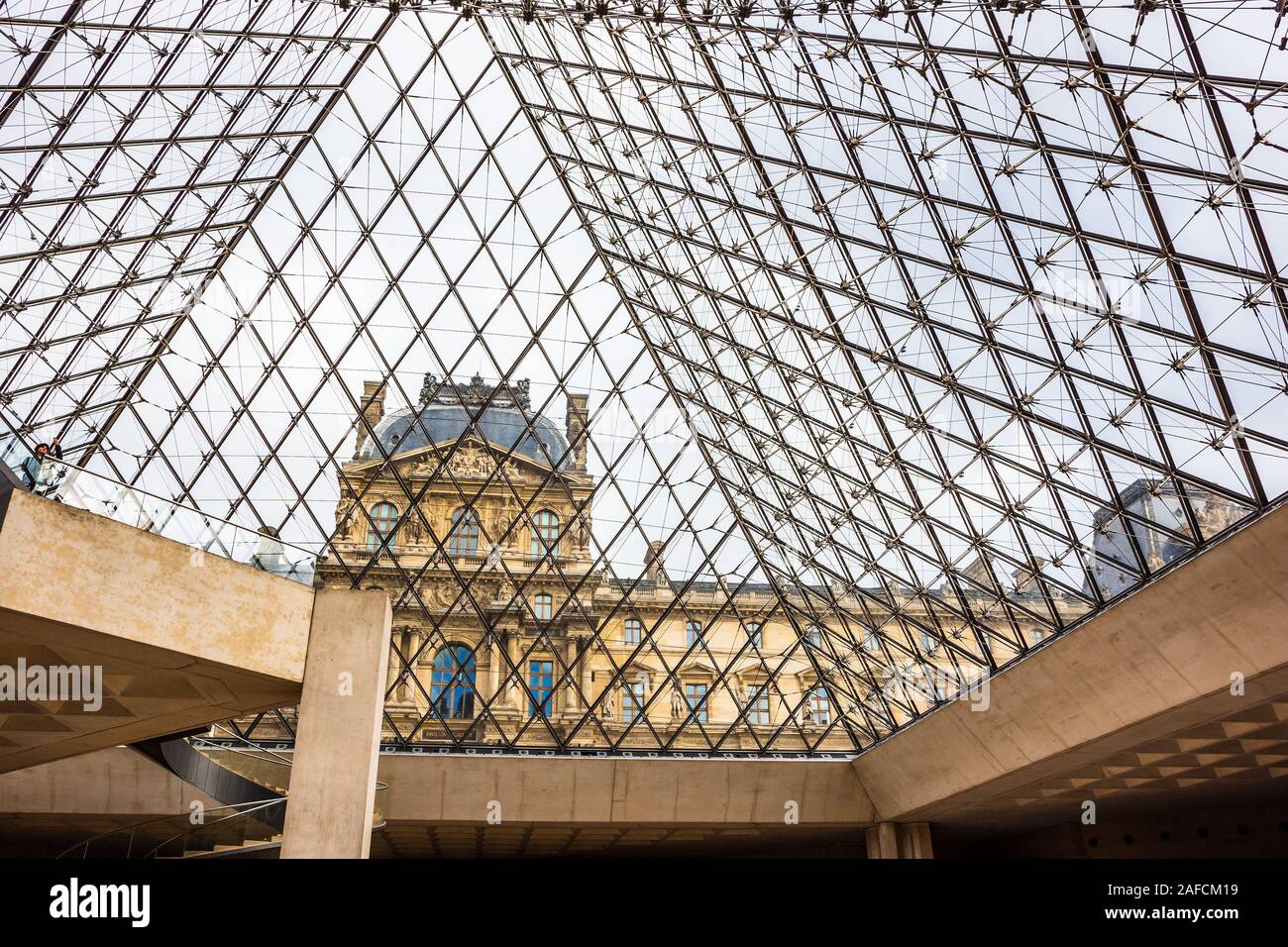 View of famous Louvre Museum with Louvre Pyramid in winter Stock Photo ...