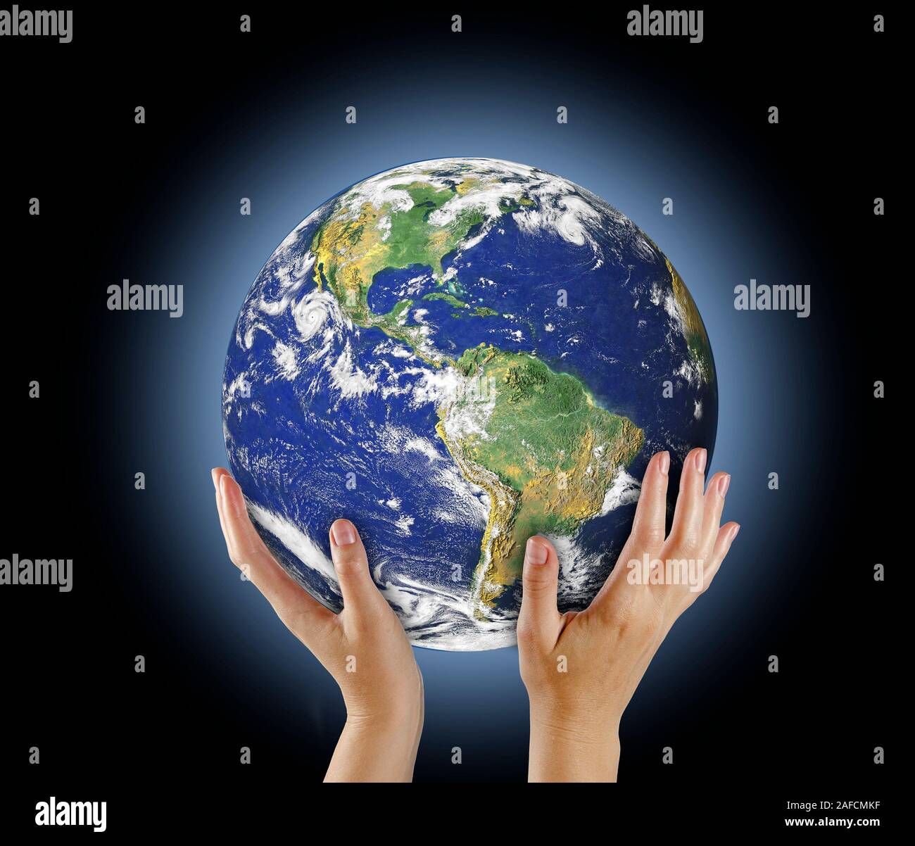 Planet Earth in hand.Elements of this image furnished by NASA Stock ...