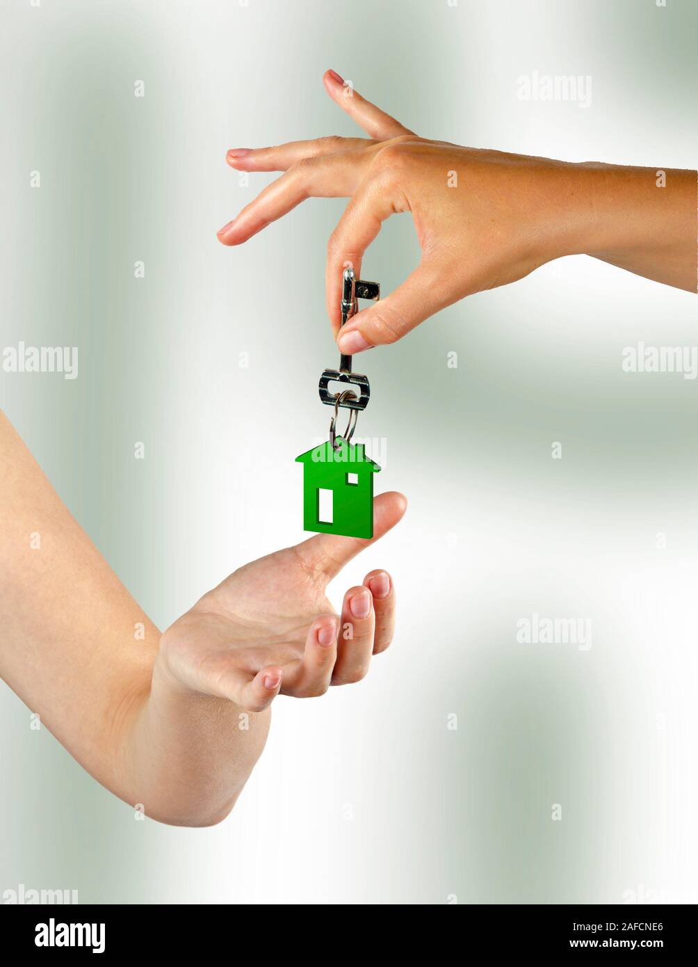 Hand with key Stock Photo - Alamy