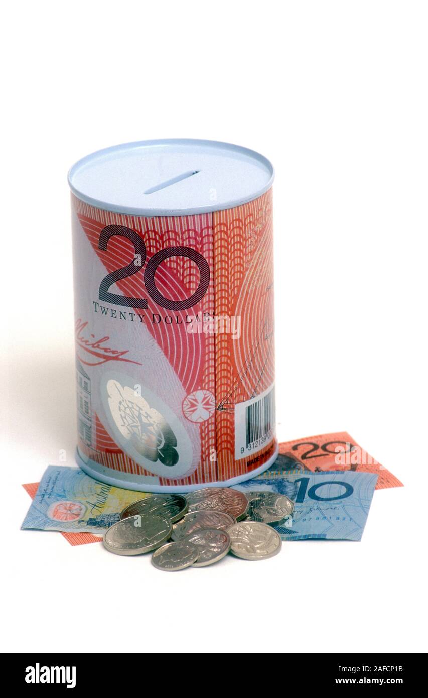 AN AUSTRALIAN MONEY BOX WITH A TWENTY DOLLAR NOTE, TEN DOLLAR NOTE AND ...