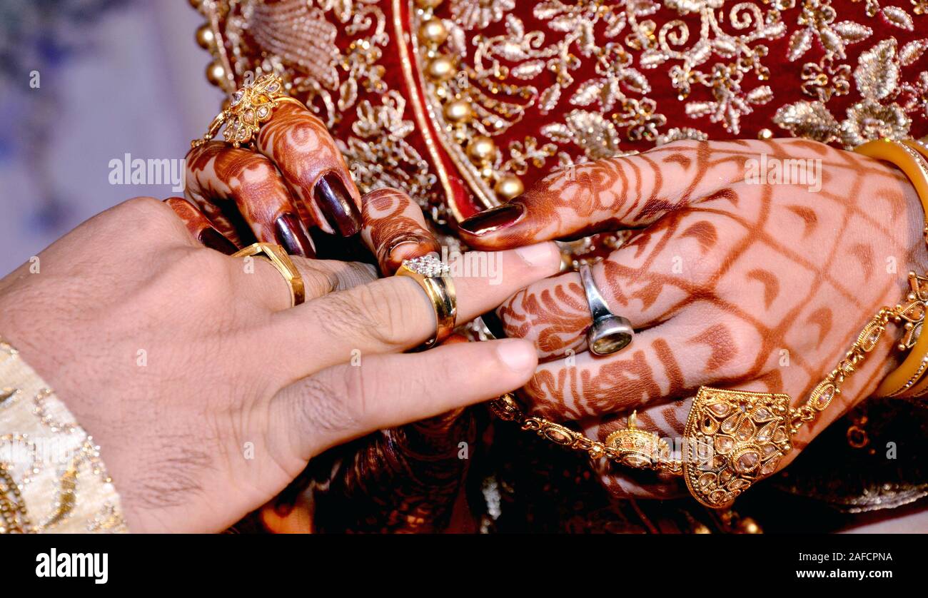 Wearing wedding ring on finger hi-res stock photography and images - Alamy