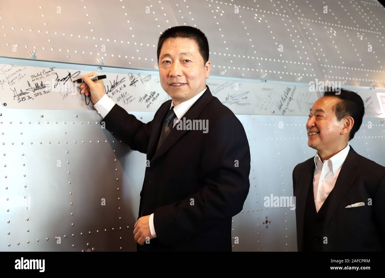 Tokyo, Japan. 14th Dec, 2019. China's first astronaut Yang Liwei (L ...