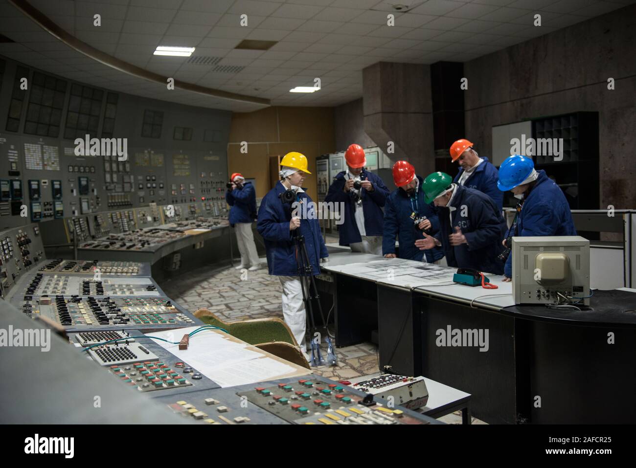 Tourists visiting the control room of Chernobyl’s reactor two with its ...