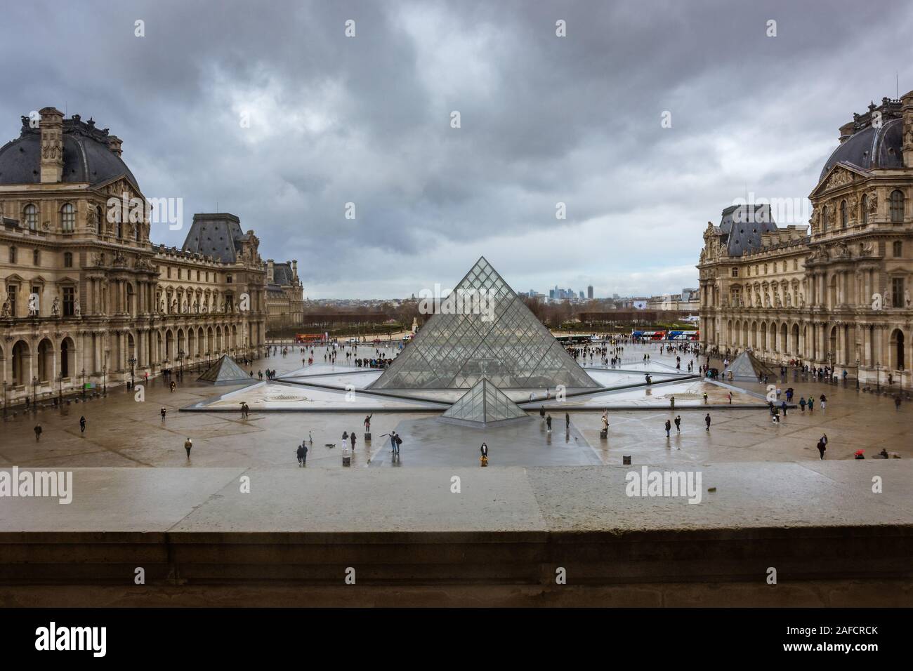 View of famous Louvre Museum with Louvre Pyramid in winter Stock Photo ...