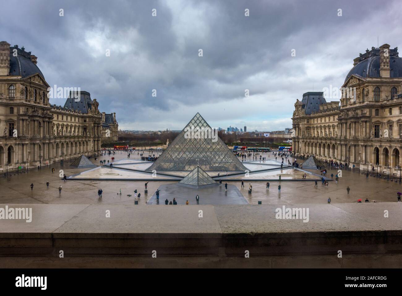View of famous Louvre Museum with Louvre Pyramid in winter Stock Photo ...