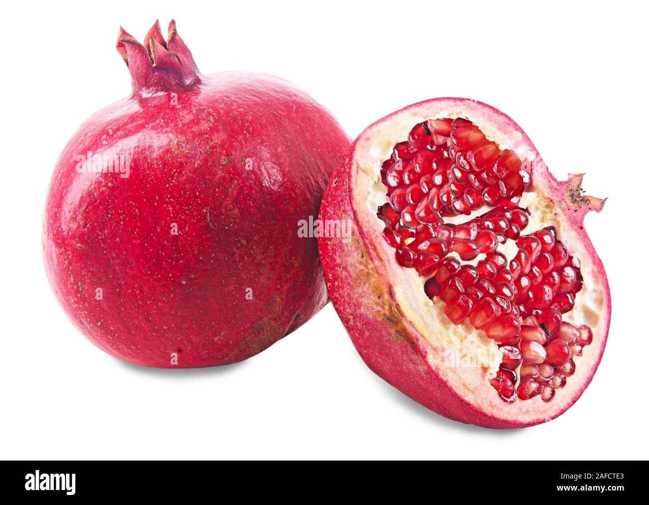 Two ripe pomegranates isolated on white background Stock Photo - Alamy
