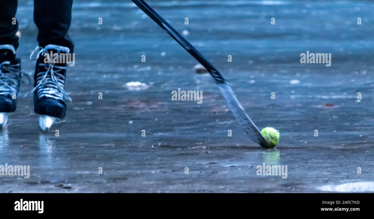 Hockey player on frozen lake hi-res stock photography and images - Alamy