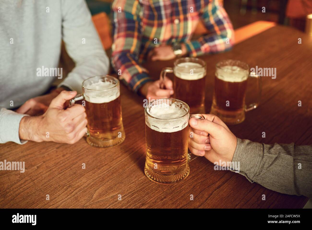 Bar cheers hands hi-res stock photography and images - Alamy