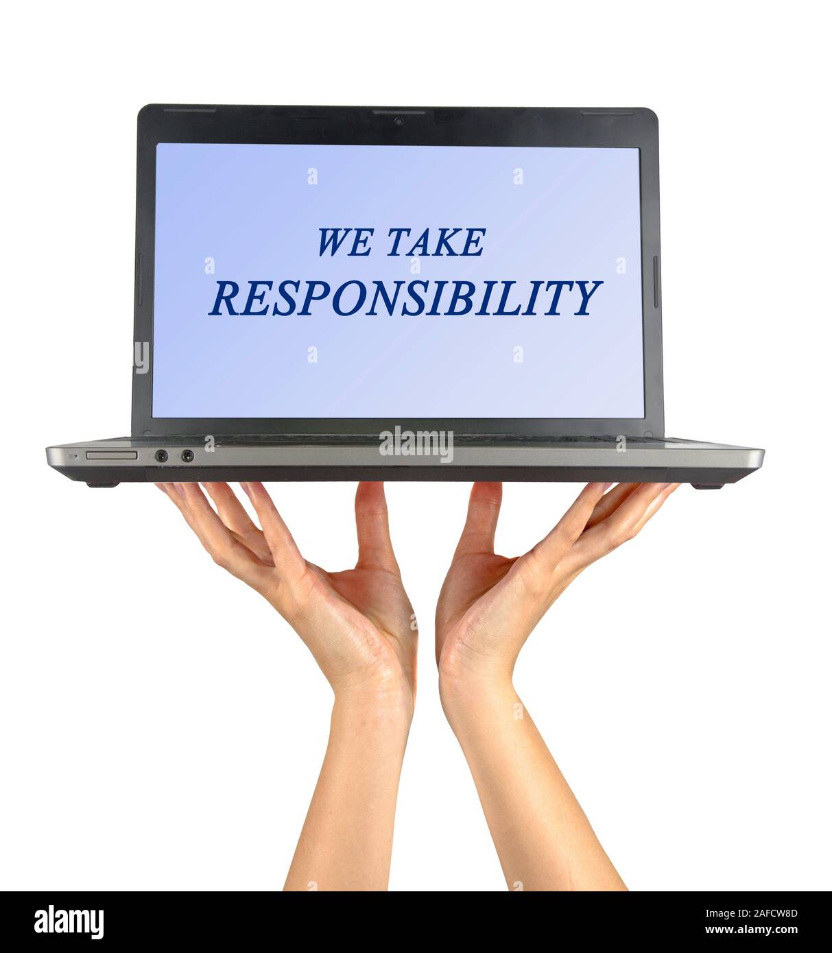 Notebook showing "we take responsibility Stock Photo - Alamy