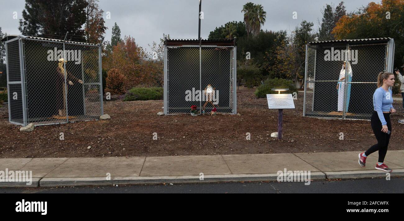 A Nativity scene depicting Jesus, Mary and Joseph as refugees in cages ...