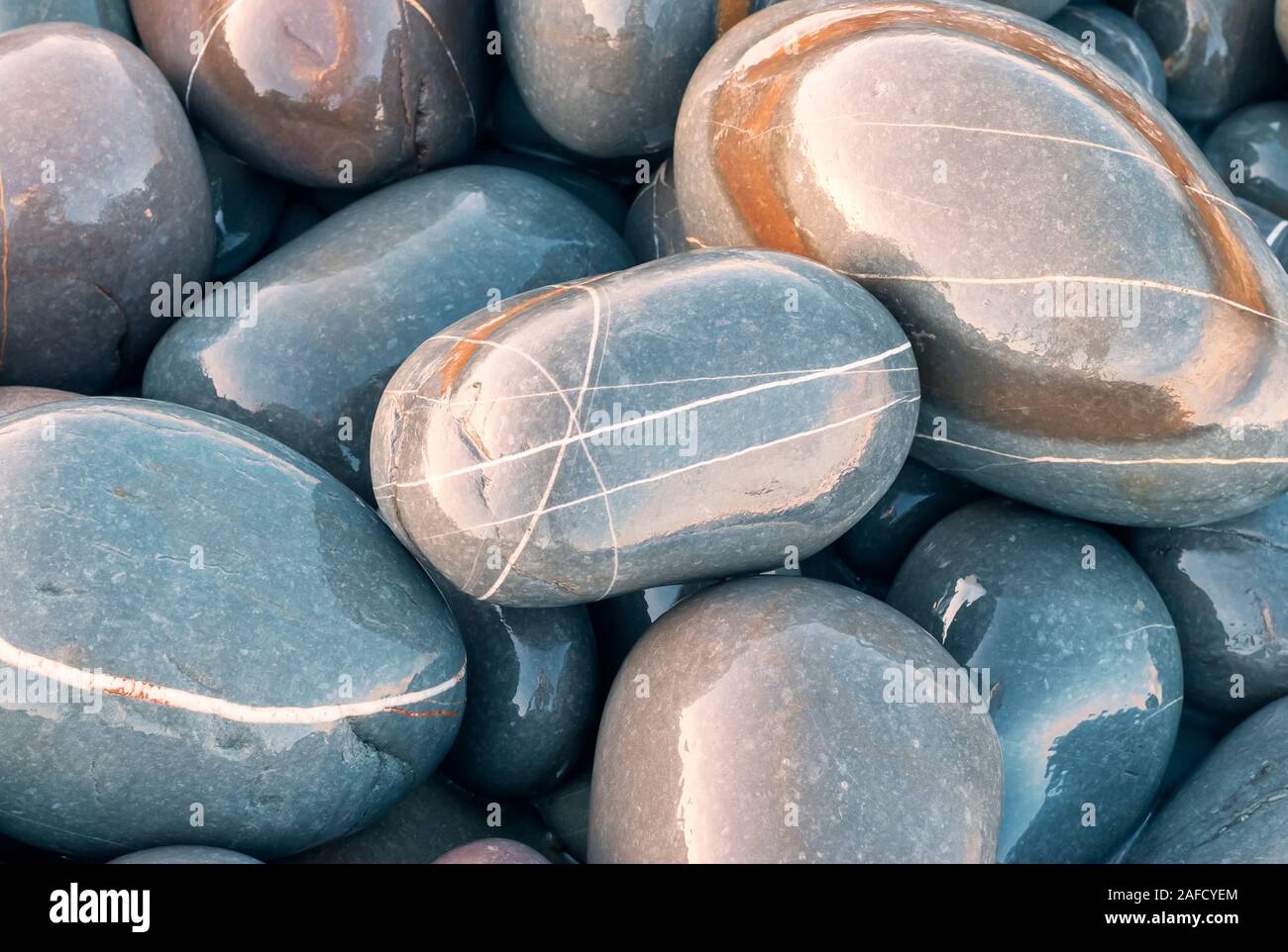 Wet shiny coastal pebbles, coastal pebbles, beach pebbles Stock Photo ...