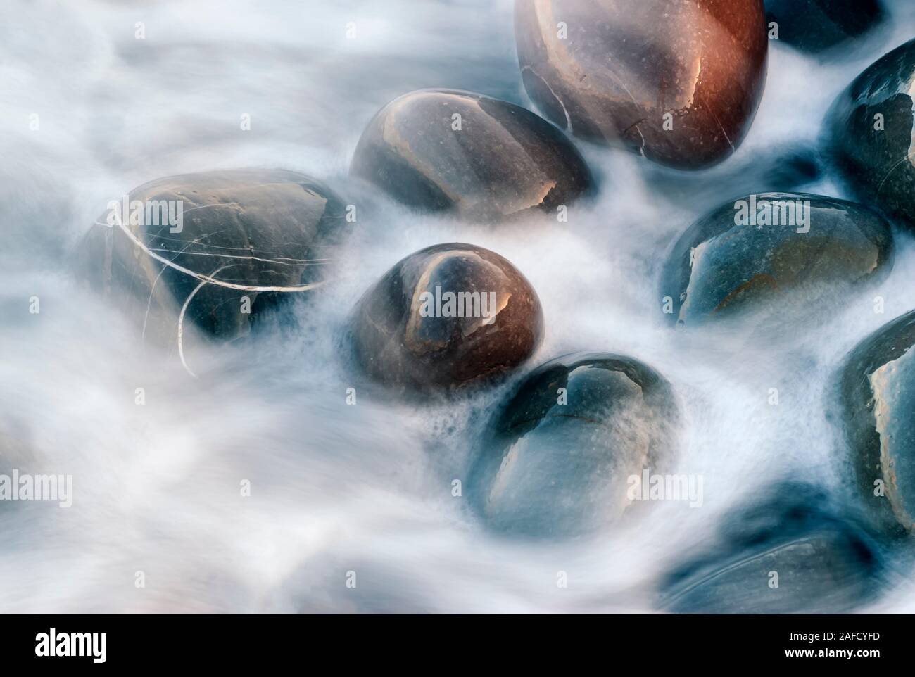 Wet shiny coastal pebbles, coastal pebbles, beach pebbles Stock Photo ...