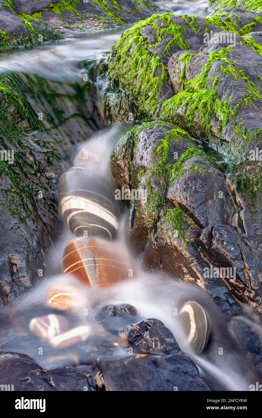 Waterfalls, water streaming over rocks Stock Photo - Alamy