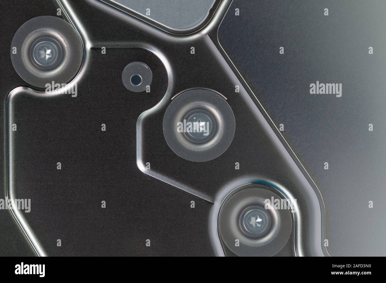 abstract metal tech background of shiny steel panel of computer hard ...