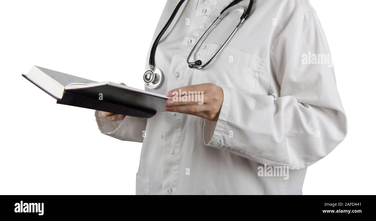 Book in doctor's hand Stock Photo - Alamy