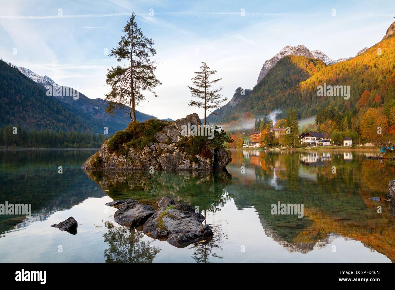 Beautiful autumn colors in the sunrise at the Hintersee lake in Bavaria ...