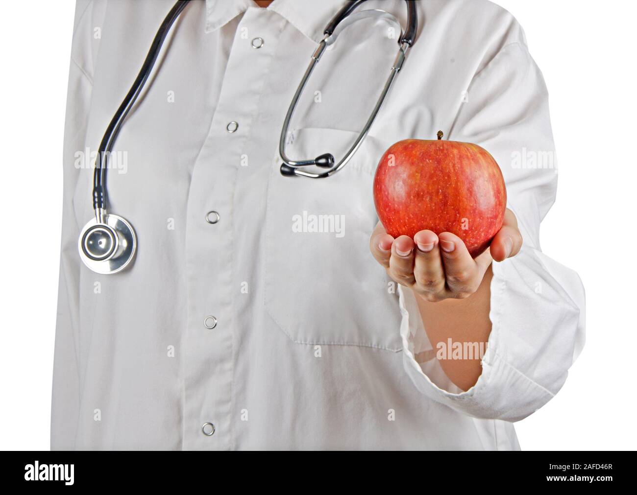 Apple in doctor's hand Stock Photo - Alamy