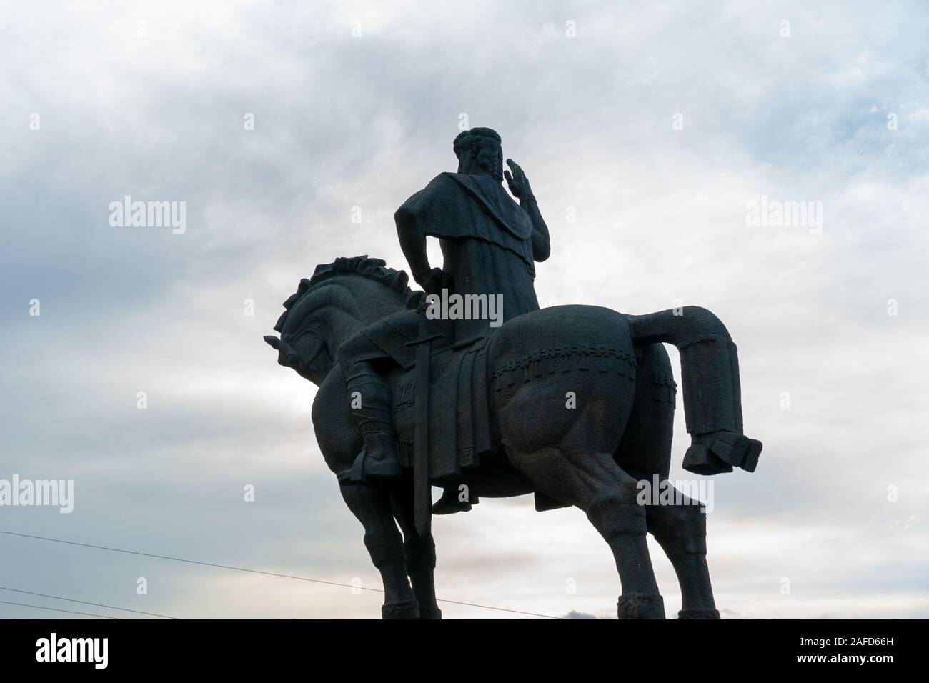 Tbilisi, Georgia, JULY, 2019: Stone equestrian statue rider with sword ...