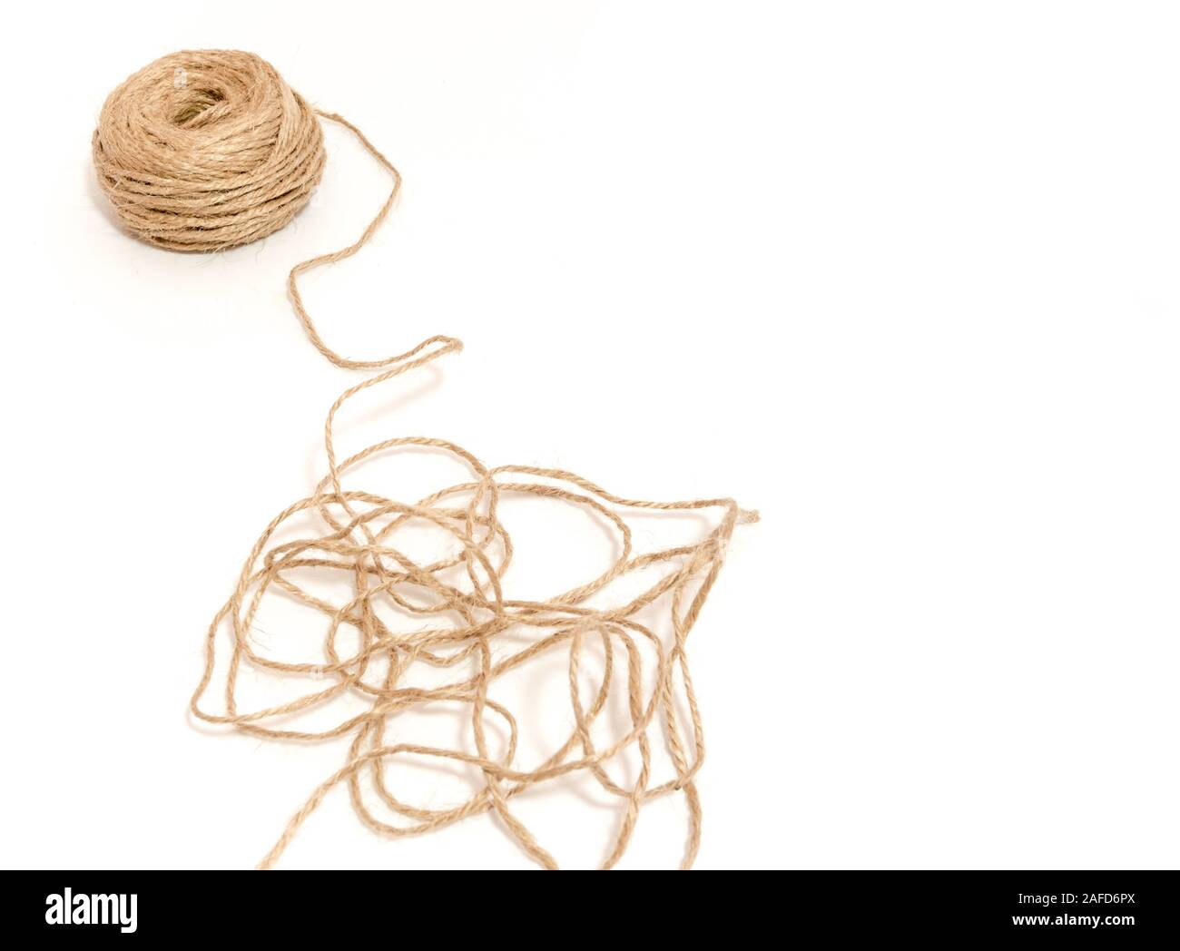 Wrapped Brown rustic hemp rope from the roll Stock Photo - Alamy