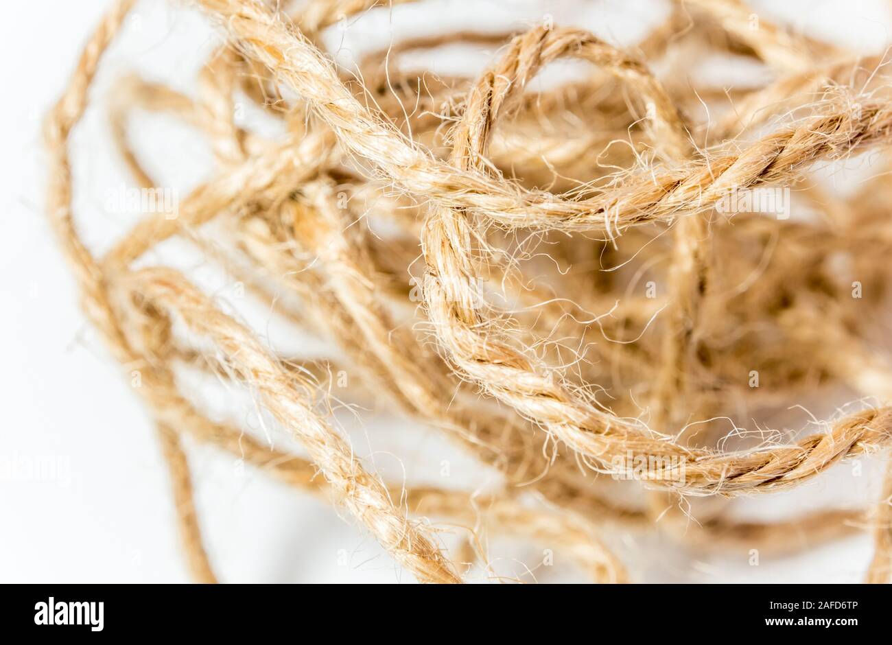 Wrapped Brown rustic hemp rope from the roll Stock Photo - Alamy