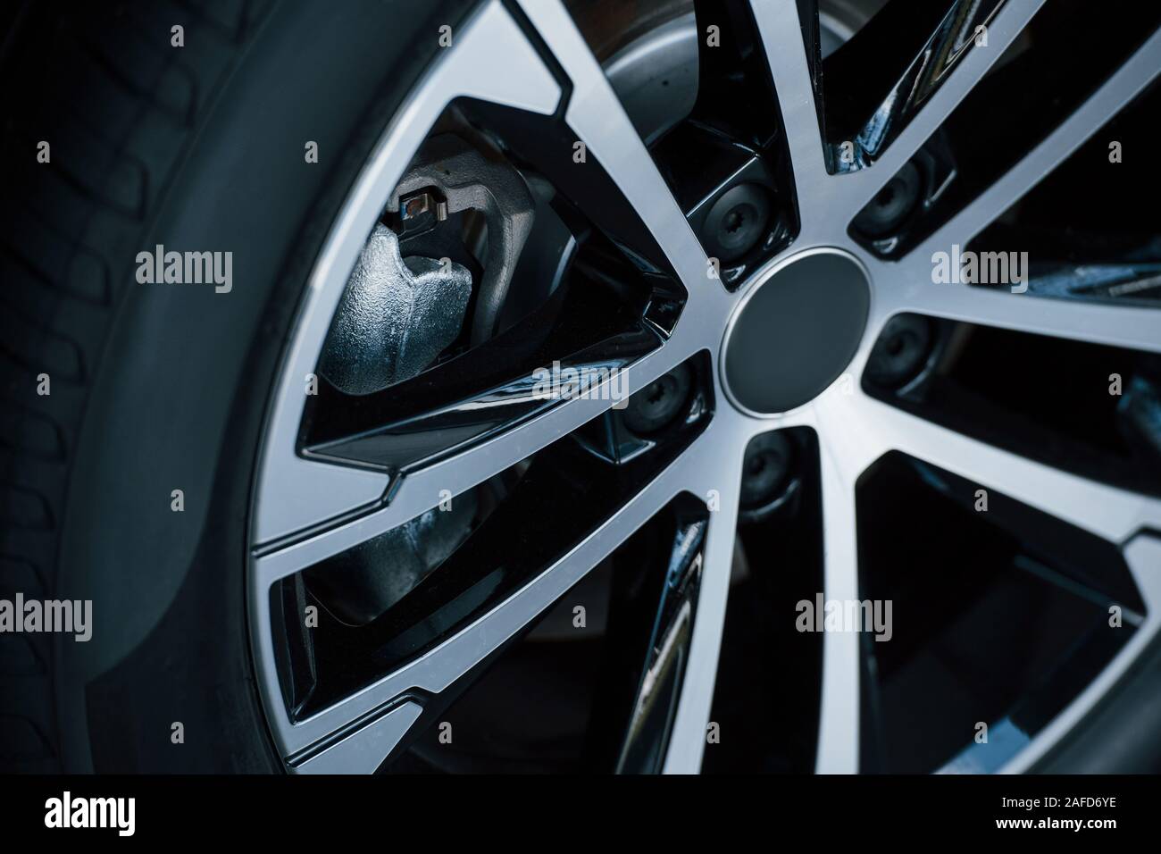 Detailed view of wheel of modern new car. Silver colored discs Stock ...