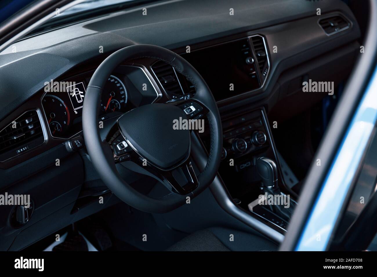 Front panel of luxury new car in the automobile salon. Black interior ...