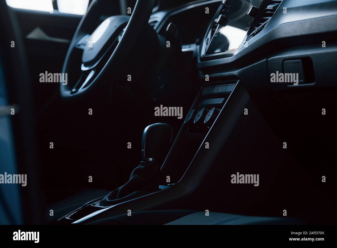 Front panel of luxury new car in the automobile salon. Black interior ...