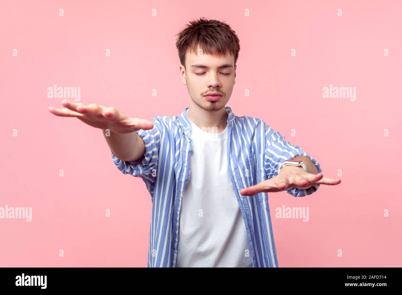 Portrait Of Disoriented Blind Brown haired Man With Small Beard And Mustache In Casual Shirt portrait-of-disoriented-blind-brown-haired-man-with-small-beard-and-mustache-in-casual-shirt
