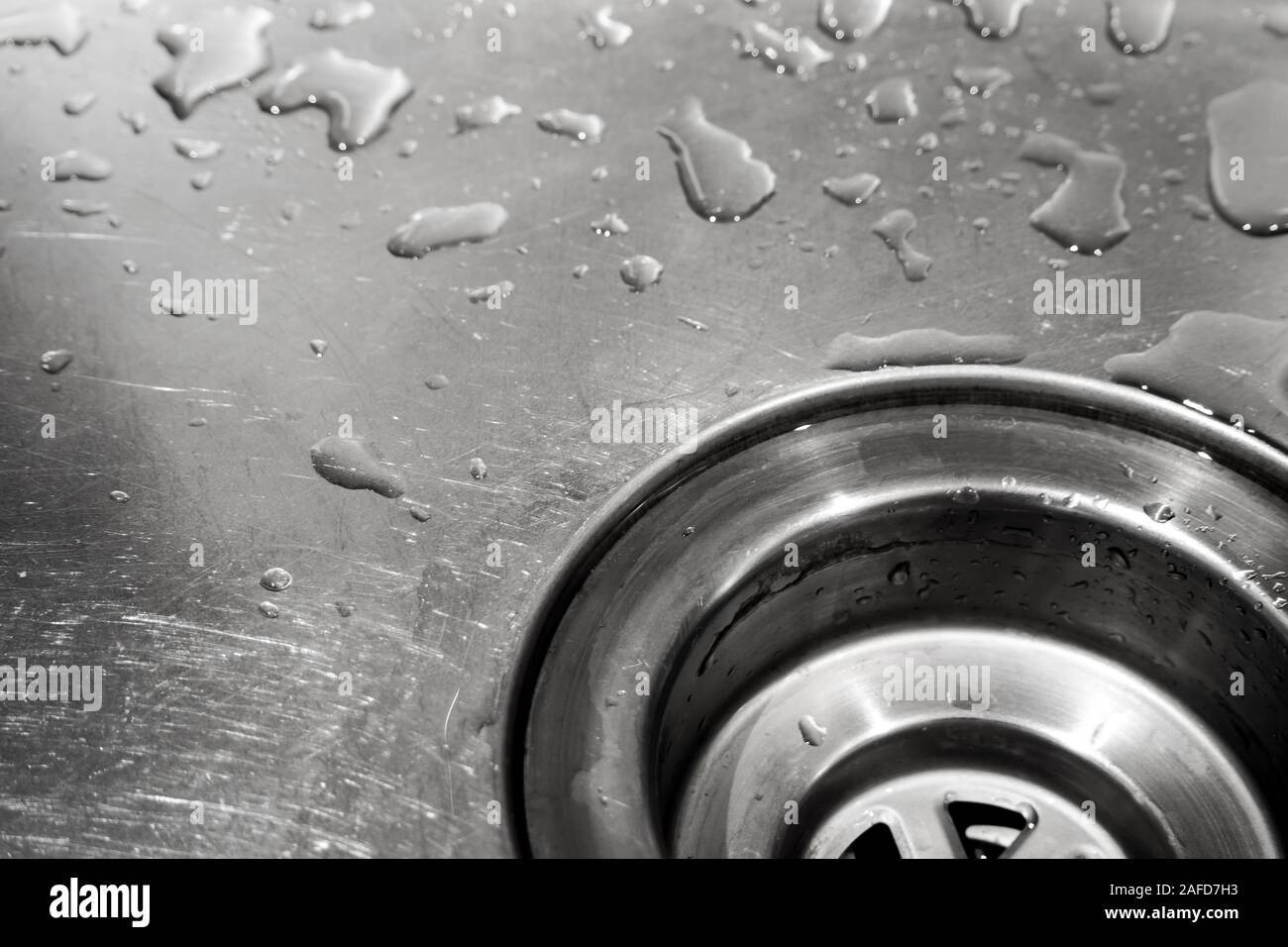 Water drops in the shiny stainless sink Stock Photo - Alamy