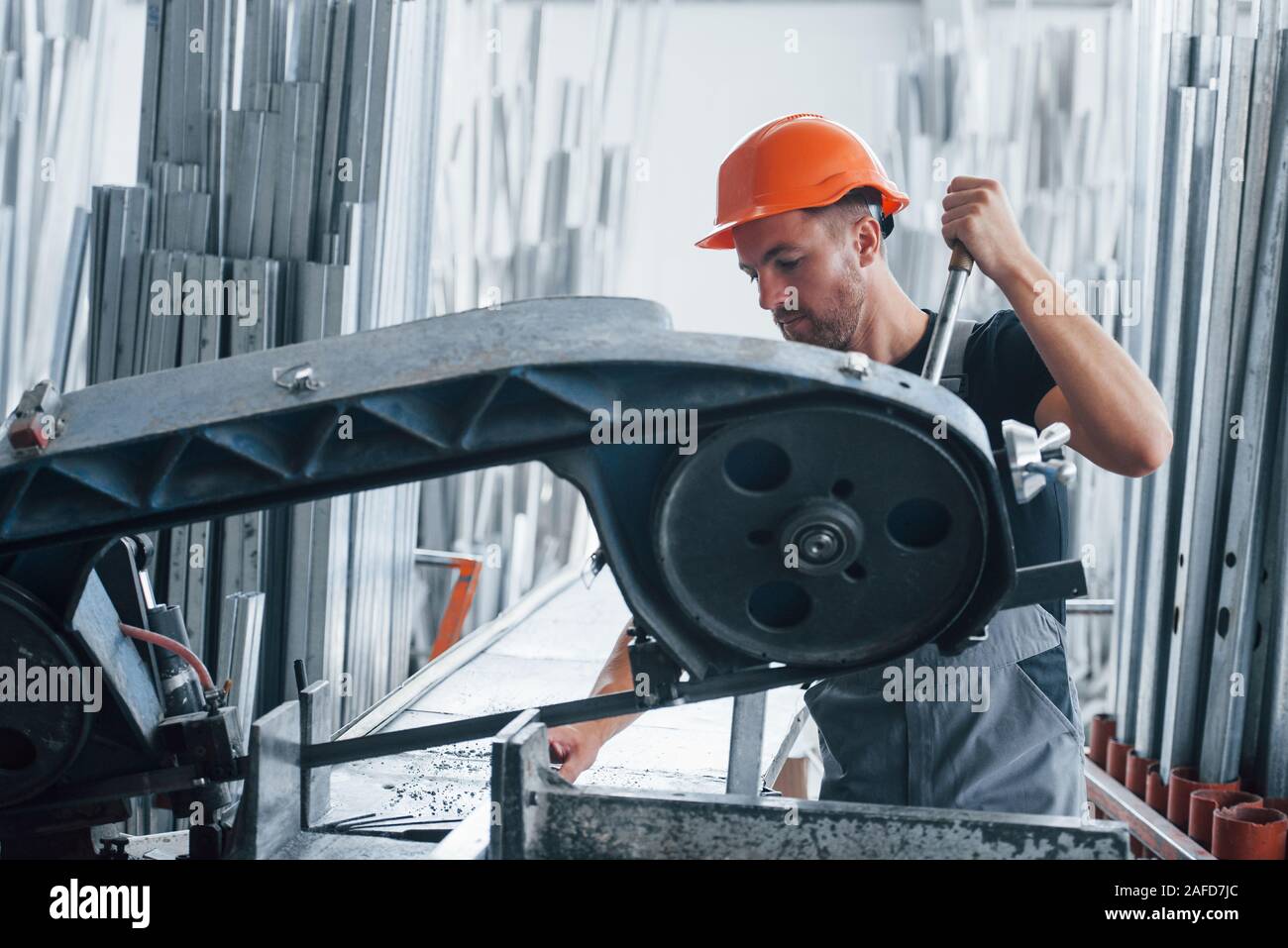 Production is on progress. Operator of machine. Industrial worker ...