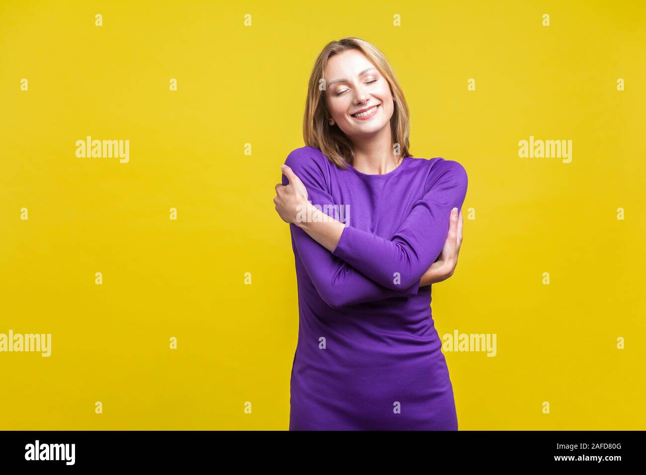 I love myself. Portrait of satisfied selfish woman in elegant tight ...