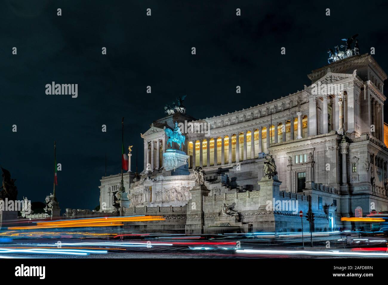 Rome unknow soldier vittoriano palace night view with car lights trail ...