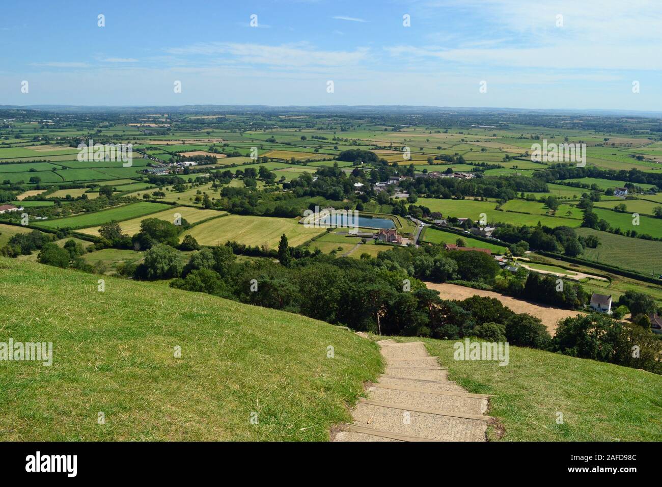 View across the Isle of Avalon, from the top of Glastonbury Tor ...