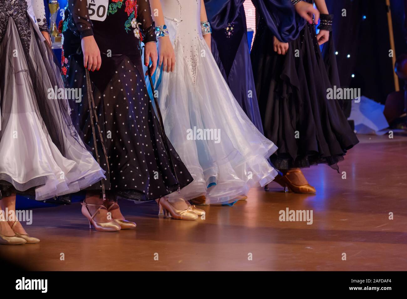 Girls in ball gowns at dance competition Stock Photo - Alamy