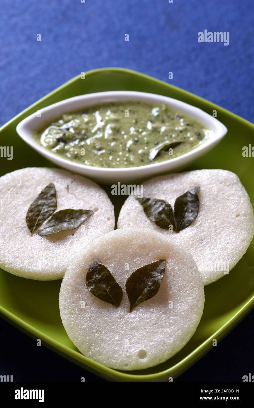 Idli with coconut chutney on blue background, Indian Dish : south ...