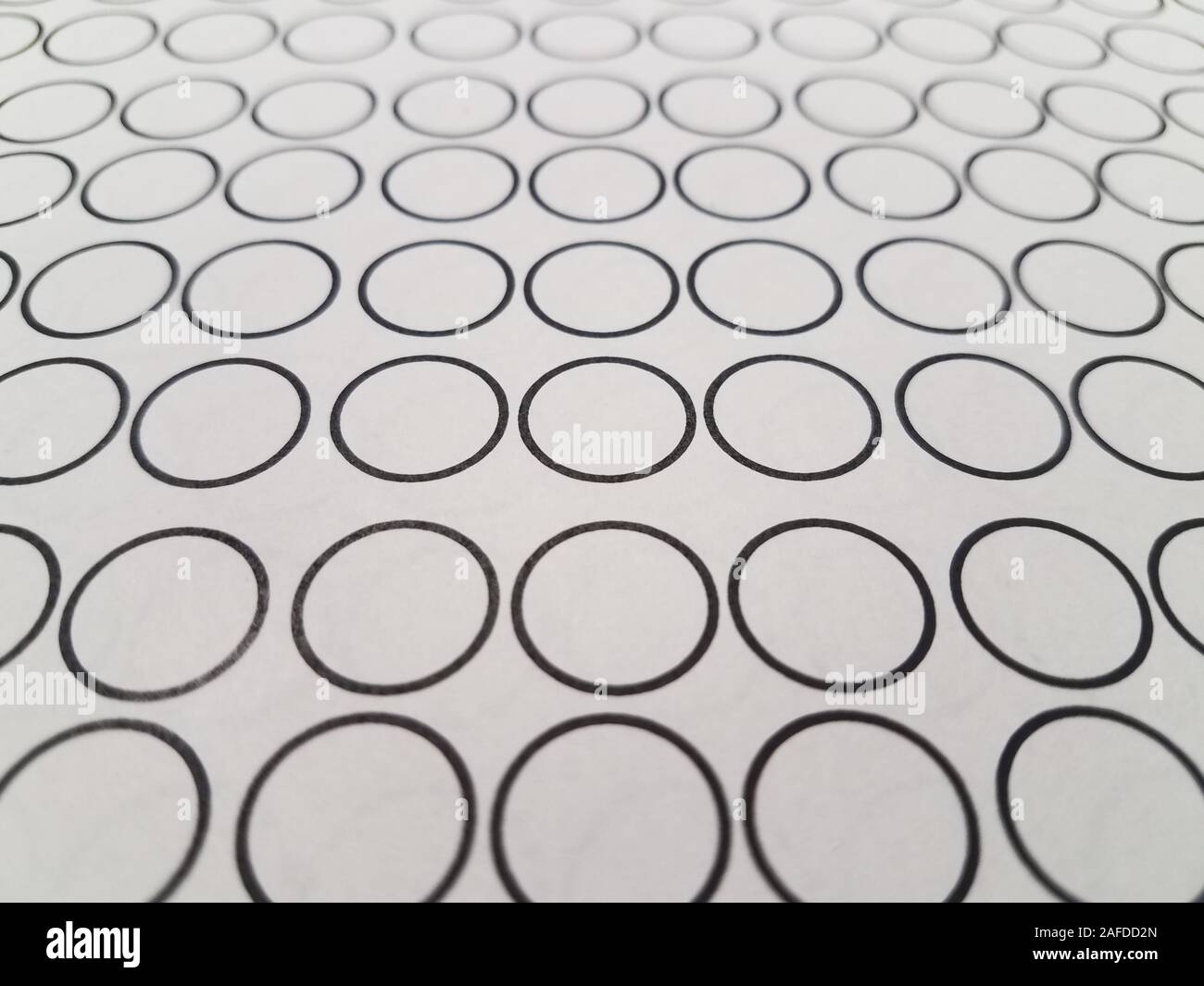 pattern of small black circles on white paper or background Stock Photo ...