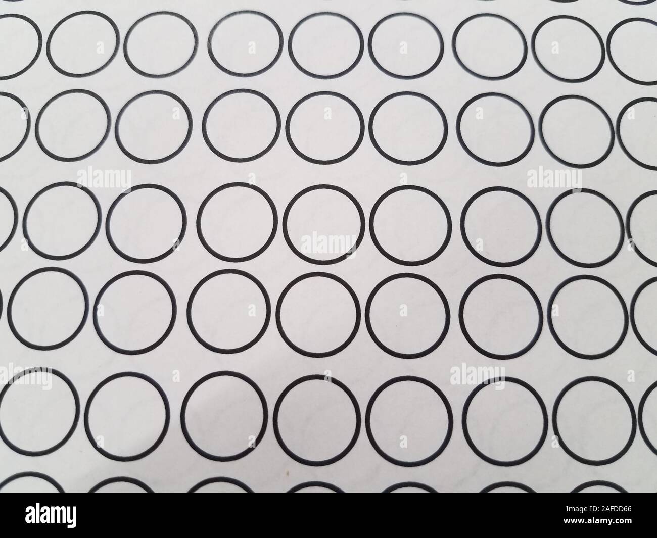 pattern of small black circles on white paper or background Stock Photo ...