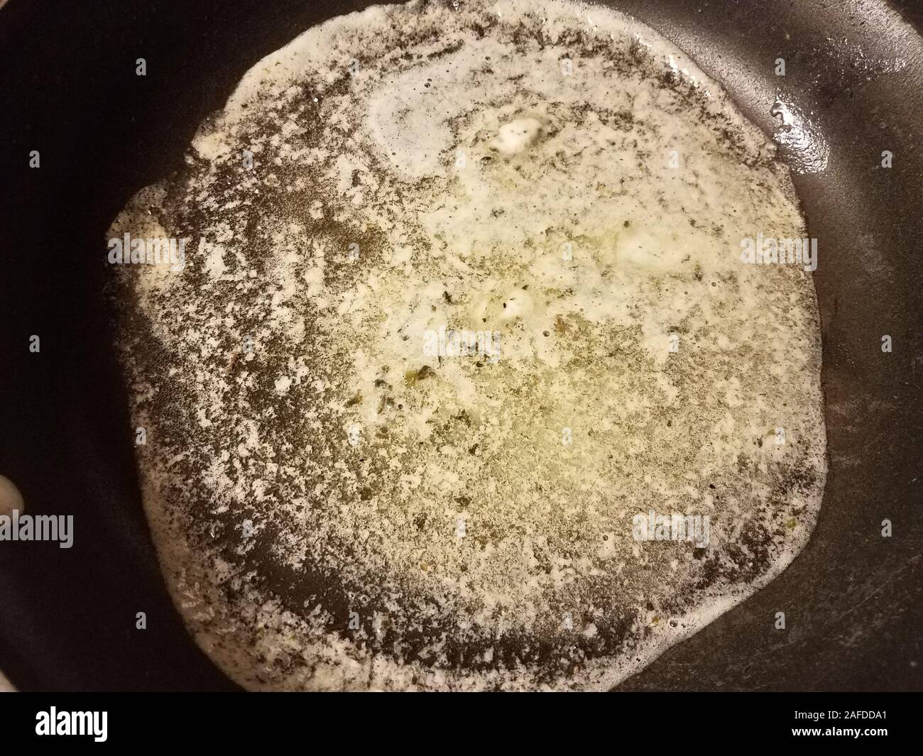 Hot pan melting butter hi-res stock photography and images - Alamy