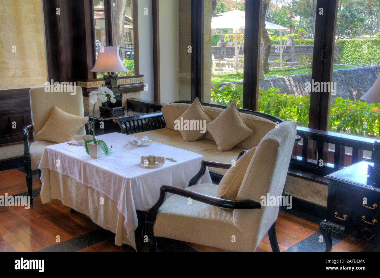 beautiful restaurant interior design with table seating and lighting and other furniture Stock ...