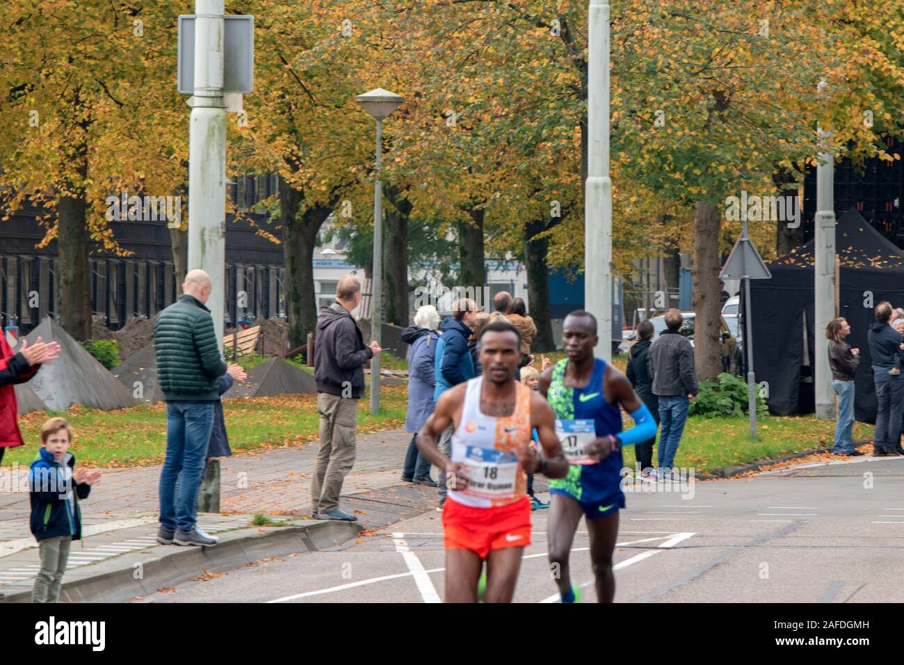 Two Runners Competing At The Amsterdam Marathon The Netherlands 2019 ...