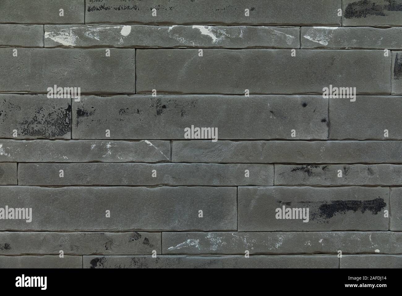 Modern dark brick wall texture background Stock Photo - Alamy